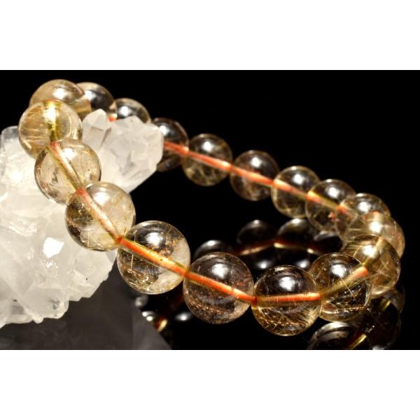 【材質】ゴールドルチルクォーツ 11mm 産地：ブラジル【サイズ】約11mm(±0.5mm)【腕周り】約16cm(伸縮性あり)【重さ】約35g【特徴・意味】ルチルらしいゴールドの輝きを存分に堪能いただけるお買い得ブレスレットが入荷しました！...