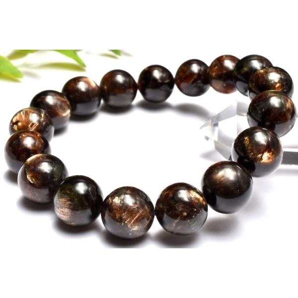 【材質】ゴールデンブラックマイカ 12.5-13mm 産地：ブラジル【サイズ】約12.5-13mm(±0.5mm)【腕周り】約18cm(伸縮性あり)【重さ】約54g【特徴・意味】黒地にキラキラ煌めく雲母の輝きが美しく華やかです。太陽光に翳す...