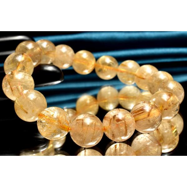 【材質】ゴールドルチルクォーツ 12.5mm 産地：ブラジル【サイズ】約12.5mm(±0.5mm)【腕周り】約17cm(伸縮性あり)【重さ】約47g【特徴・意味】金色のルチルが上品な輝きを添えるゴールドルチルクォーツのブレスレット、洗練さ...
