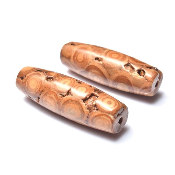 【材質】龍宮舎利石 45-53x14-16mm 産地：タイ【サイズ】約45-53x14-16mm【重さ】約14-20g【特徴・意味】大地の神秘をそのままに──龍宮舎利石の原石を丁寧に加工して仕立て上げました。ご利益のある仏眼のような模様も含...