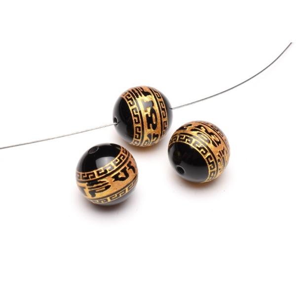 【材質】オニキス 六字真言 金彫 3粒セット 8mm　産地：ブラジル【サイズ】約8mm【重さ】約2g【特徴・意味】六字真言・六字大明王陀羅尼が浮かびあがる圧巻の彫刻品です。珠の面積が広く見応えがあります。数珠等の制作アイテムとしても最適です...