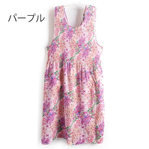 ポリエステル素材の花柄のプリントのエプロンです。胸もとの細かなプリーツがとてもおしゃれでお洋服っぽくも着ていただけます。おしゃれなプリントなのでまるでお洋服のような雰囲気がします。ワンピース風のロング丈です。とても華やかで上品な雰囲気のエプ...