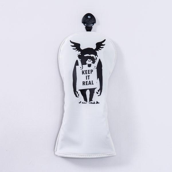 スプレーグラフィティ文化をアートとして広めたイギリスを拠点とする素性不明のアーティスト、バンクシーのアートワークをフィーチャーした限定ゴルフアイテムのヘッドカバーです。アートワークが強調されたデザインです。フェアウェイウッド用です。