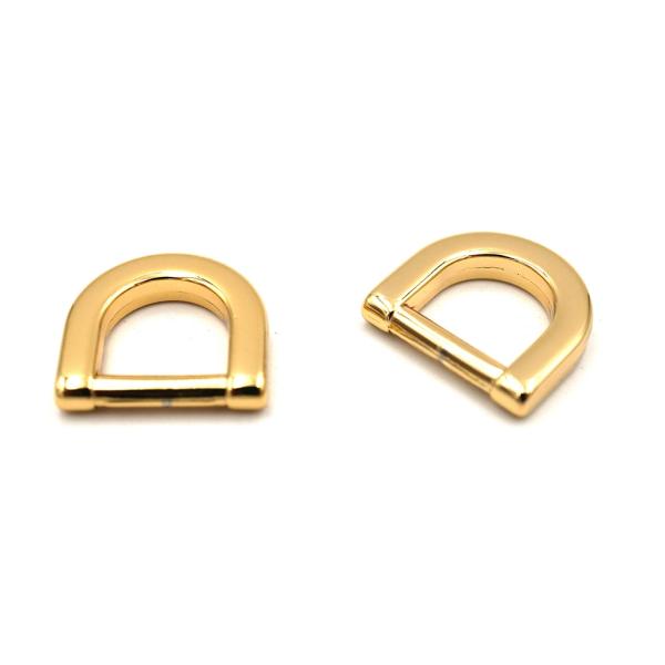 ■用途/特長閉じた輪金具です。カバンの持ち手、ショルダー紐のつなぎ金具などによく使われる金具です。■仕様／内容［サイズ］テープ幅/9mm　　外径/巾15mm/高さ14mm　色：ゴールド(本金)数量：2個入り【当店取り扱いの金具の色表記につい...