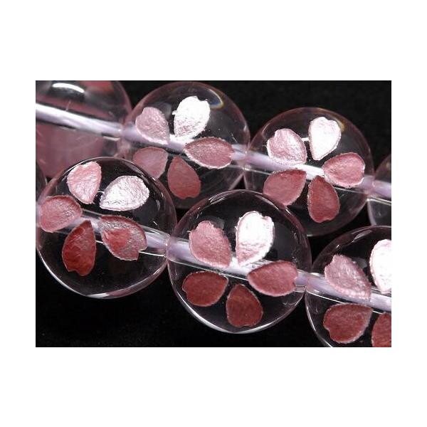 【天然石卸】ピンク　桜彫り　 8ｍｍ　一粒売り〜商品詳細〜ピンク　桜彫り　 8ｍｍ　一粒売り　サイズ　　8mm水晶にピンクの桜が彫刻されています。