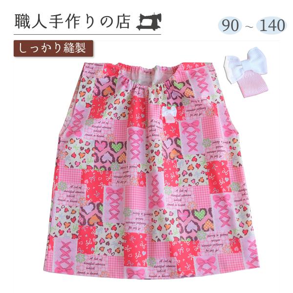 りぼんとハートが可愛いノースリーブスモック♪名札ワッペンにはリボンがあしらわれていて可愛い♪首の後ろにはフックにかけられる 便利なループ付き！ちょい掛けに！裏にはネームタグがしっかり縫いつけられています！幼稚園・保育園ではもちろん、エプロン...