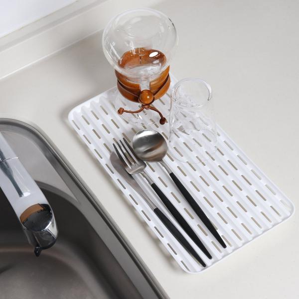 サイズ/約幅32.7×奥行17×高さ2cm内容量/1個材質/本体：ポリプロピレンすべり止め：熱可塑性エラストマー生産国/日本製耐熱温度/140度●洗い物をサッと置ける水切りプレート●水切りカゴとしても使用可能●スタイリッシュな「HAUSシリ...