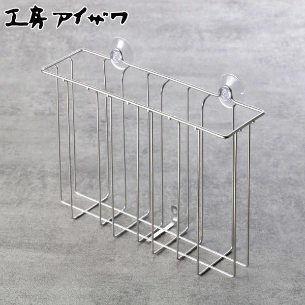 サイズ/約幅26×奥行8×高さ19cm内容量/1個材質/18-8ステンレススチール生産国/日本製●ラップやアルミホイルなどをまとめて立てて収納することができます。●使いたい時にサッと取り出せて調理もスムーズに。●冷蔵庫の側面やシンク扉の内側...