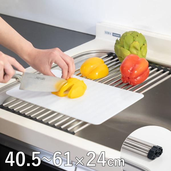 サイズ/約幅24×奥行40.5〜61×高さ1　cm重量/約530g内容量/1個材質/本体：ステンレス鋼キャップ：シリコーンゴム生産国/中国製パーツ別耐熱温度/キャップ：200度耐荷重/約5kg●クルクルまとまってすっきり収納できる水切りラッ...