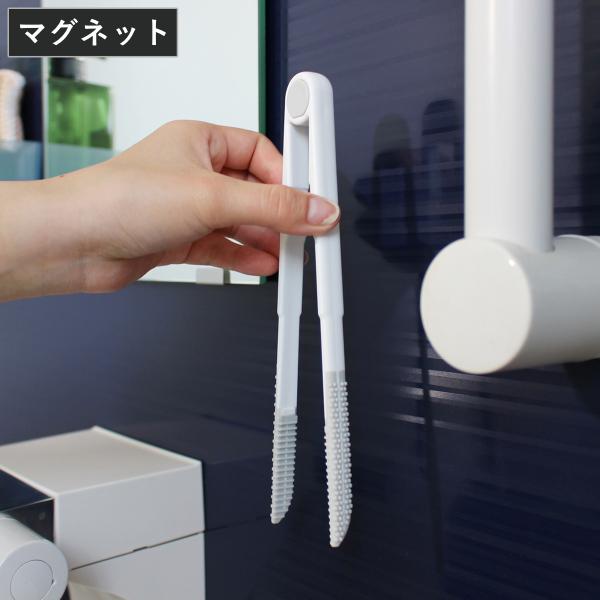 サイズ/約幅5.5×奥行1.5×高さ21cm内容量/1個材質/本体：ABS樹脂、合成ゴム磁石：ネオジム磁石生産国/中国製耐熱温度/50度●マグネットで浴室の壁にピタッと収納できる排水口用トング＆ブラシです。●排水口・ゴミ受けカゴの汚れ（ぬめ...