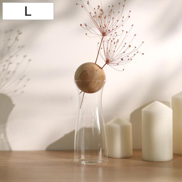サイズ/約高さ21cm直径：約7cmガラス：約直径7×高さ18cm木球：約直径6.5cm木球穴：約直径2cm重量/約200g内容量/1個材質/ガラス ・天然木●木とガラスの異素材を組み合わせたカジュアルな一輪挿しLサイズです。●一輪挿しとし...