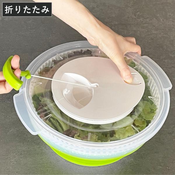 サイズ/約幅30.5×奥行28.5×高さ14cm折りたたみ時：高さ 約7cm重量/約1kg内容量/1個材質/PP・TPR・AS・ABS 生産国/中国製●コンパクトに折りたためるサラダスピナーです。●シンク下など薄型の引き出しに収納できます。...