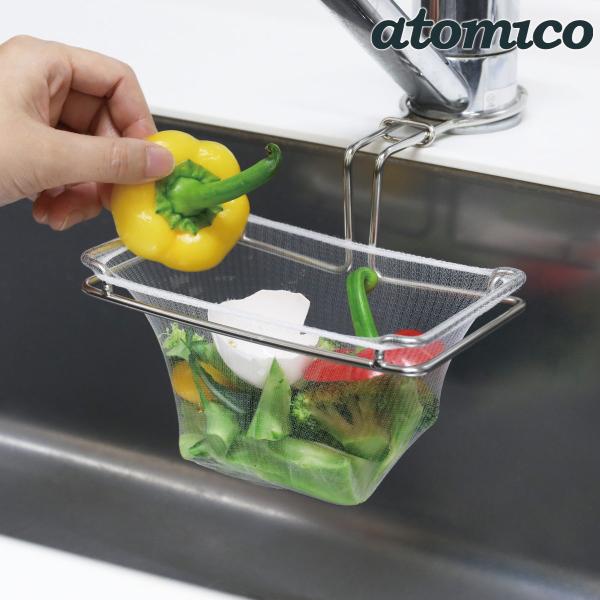 サイズ/約幅16.3×奥行19.7×高さ5.8cm重量/約108g内容量/1個材質/本体：ステンレスすべり止め：塩化ビニル樹脂、シリコーンゴム生産国/中国製耐荷重/約1.5kg●浮かせて衛生的に使える水切りネットホルダーです。●シンクに触れ...