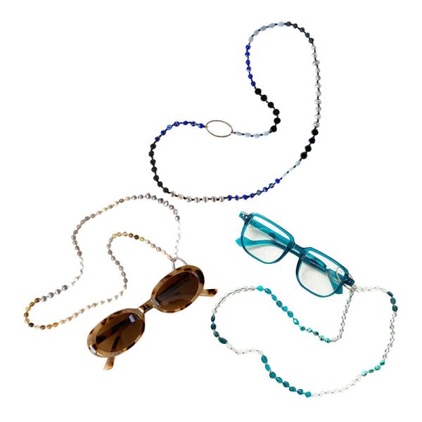 TATTEBYTATTE(タッテバイタッテ)は2003年に生まれた天然石アクセサリーのブランドです。※納期約2週間程度いただきます■長さ：68cm■素材：【ブルーケイ】淡水パール、オニキス、エンジェライト、ラバ、ラピスラズリ、合金、コットン...