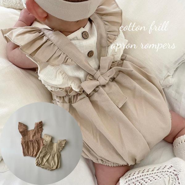 ・素材構成: 95%綿、5%ポリエステル・size: 60~90・color: beige / pink・肩のフリルとバックスタイルが可愛いエプロンロンパース・リネン混のものと比べると少し厚手です・後ろは肩紐を穴に通してご自身で結ぶタイプで...
