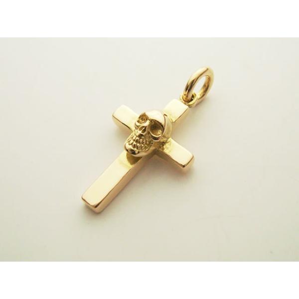 １８金製のスカルonGBYクロス ペンダントトップお客さまからリクエストがあり制作しました。小振りですがボリュームあるフォルムです。裏面は「God Bless You」神様のご加護がありますように、と手彫りされたクロスのペンダントトップです...