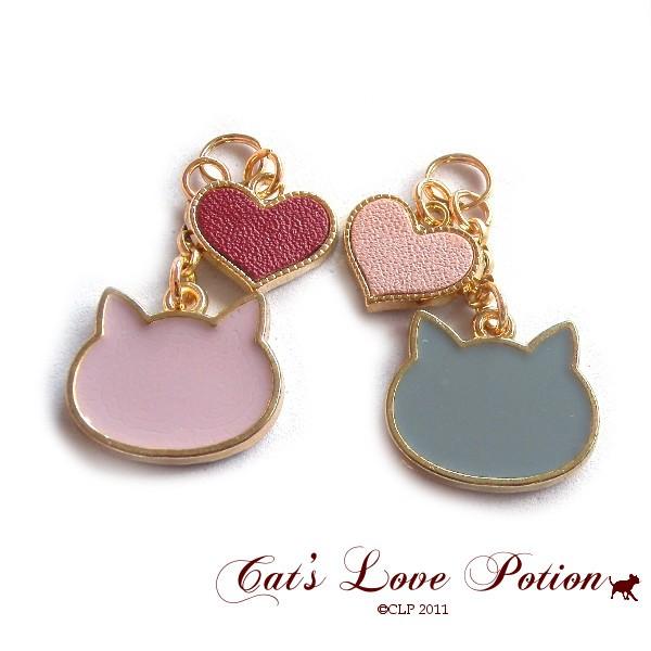 合皮のハートとねこのフェイスのストラップです。シンプルなデザインでかわいくお使いいただけます。 お好きなパーツが選べるのでプレゼントにも最適です。猫チャーム：約15×20mm 合皮ハート：約10×15mm素材：スチール合金・合皮