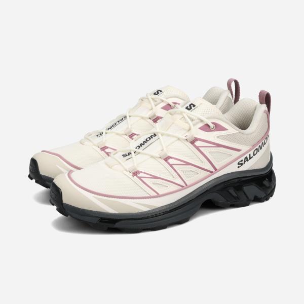 サロモンの象徴とも言えるXT-6は、トレイルの伝説的モデルたちの長い系譜を受け継ぎ、都会の風景にも完璧に適応しています。XT-6 EXPANSEは、このシリーズに新たな質感と深みをもたらします。贅沢で伝統的な素材をステッチパネルとステッチ入...