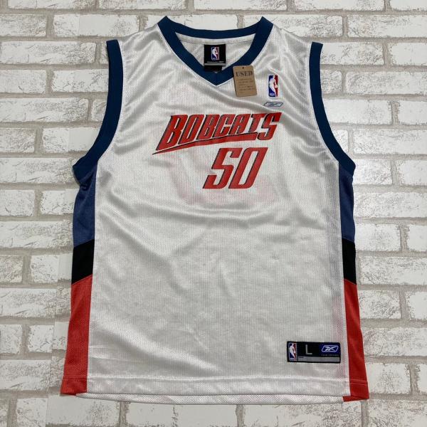 【ブランド】NBA Reebok【生産国】ロシア【コンディションランク】Aランク表面・ロゴプリント（貼り付けタイプ）少しだけ剥がれ/小さい毛羽立ちあり背面・右わき部シミ/小さい毛羽立ちあり【表記サイズ】キッズL（14ー16）サイズ（子供服）...