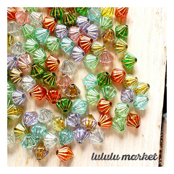 ソロバン型のアクリルビーズ50個セット。ゴールドメッキのラインが入った、色々なカラーがミックスされています。◆サイズ：約6mm×6.5mm、穴＝約1.5mm◆素材：アクリル※多少の割れ、欠け、バリ残りなどが含まれることがございます。また、ビ...