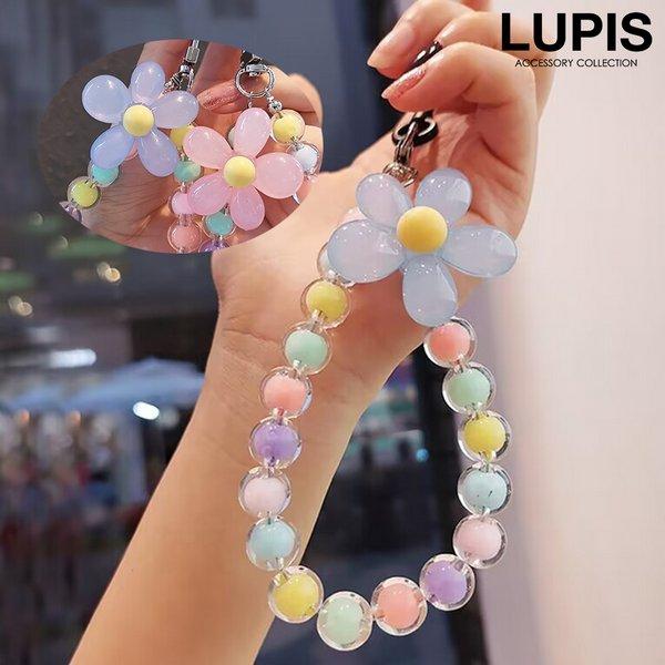 品番 : a347サイズ : 約14cmモチーフサイズ : (ビーズ)直径約1.2cm(フラワー)直径約3.8cmご使用方法 : スマホケースに着用の場合は、ストラップホールに付属品の黒いストラップを通していただくか、別売りのストラップホル...