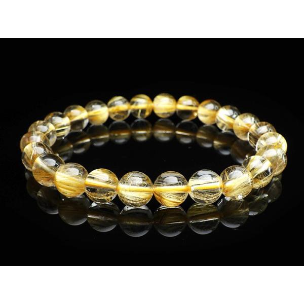 高品質のブラジル産ルチルクォーツ、ラウンドビーズです。 画像を見て頂いても分かる通り、どの粒も鮮やかなゴールドの針がしっかりと入っています。 粒によっては「タイチンルチル」と呼べそうな太い針のものも盛られます。ルチルクォーツ　・英名　　Ru...