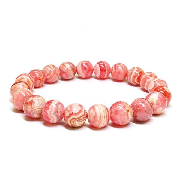 インカローズは13世紀の南米アルゼンチンで初めて発見され、1813年にドイツの鉱物学者ハウスマンによって「ロードクロサイト」と名付けられました。・英名 Rhodochrosite (Incarose)・和名 菱マンガン鉱・色 赤　ピンク　褐...