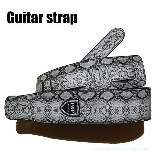 【サイズ】長さ最長約150cm（調節可）、幅約6.5cm【素材】　PUレザー【付属品】取付用紐どんな楽器やファッションにも合わせやすいベーシックながら個性的なデザインのギターストラップ。※柄のパターンは商品ごとにサンプル画像とは多少の違いが...