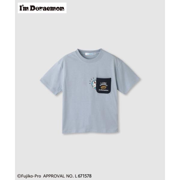 ポケットの仕掛けに思わず笑顔になる半袖ギミックTシャツ。カラーは、サックスです。■デザイン見ているだけでハッピーな気分に♪胸元の配色ポケットから、ドラえもんがひょっこりと顔を出しているような遊び心あふれるデザイン！ポケット部分には大好物の「...