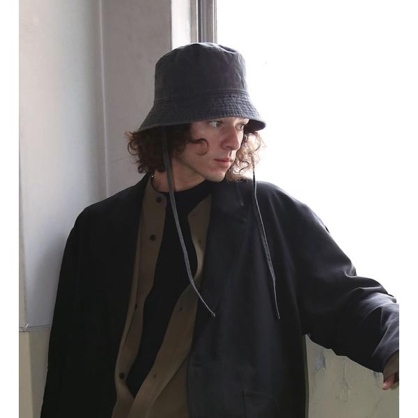 コットン１００％コットンツイル生地を使用しバイオウオッシング加工を施した紐付きバケットハット小ぶりなサイズ感で横に広がらず縦向きな形【QUOLT (クオルト)】quoltとは“quotability - 手本とする価値のある”という意味を込...