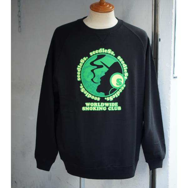 煙を吐く男の影のとボタニカルのサークルグラフィックのラグラントレーナーWorld wide smoking club のロゴ１０oz裏パイルスウエットで軽めでレギュラーシルエットボディXLサイズ着丈７４、５ｃｍ身幅６０ｃｍコットン１００％s...