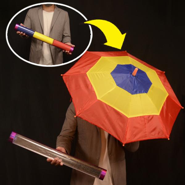 大型の透明な筒の中で３色のスカーフがパラソルに変わる！