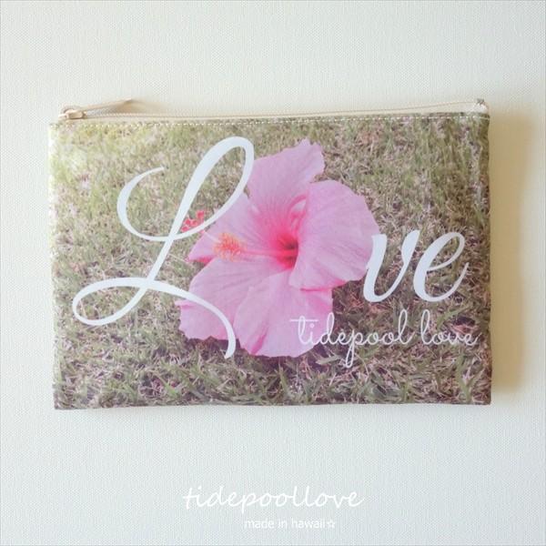 ハワイ発、[tidepool love Hawaii / タイドプールラブ ハワイ]のビーチクラッチバッグです。アイキャッチーなかわいいデザイン＋カジュアルでクッション性のある素材です。サイズ：約15.25cm x 約22.85cm海,サー...
