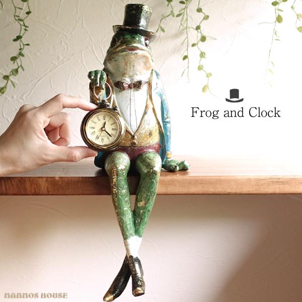 懐中時計を持ってシルクハットと紳士服を着たお洒落なカエルのオブジェシーズン問わずアンティーク雑貨とコーディネートして飾れる置き物です。蛙は無事カエル(帰る)と言われ、縁起物としても扱われるので玄関飾りにもピッタリ♪サイズ：幅150×奥行16...