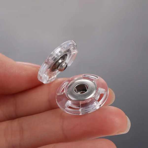 Name:ButtonMaterial:PlasticColor:TransparentSize:18mm/21mm/23mm/25mmPackage Include:10 Pairs ButtonsThere may be a certa...