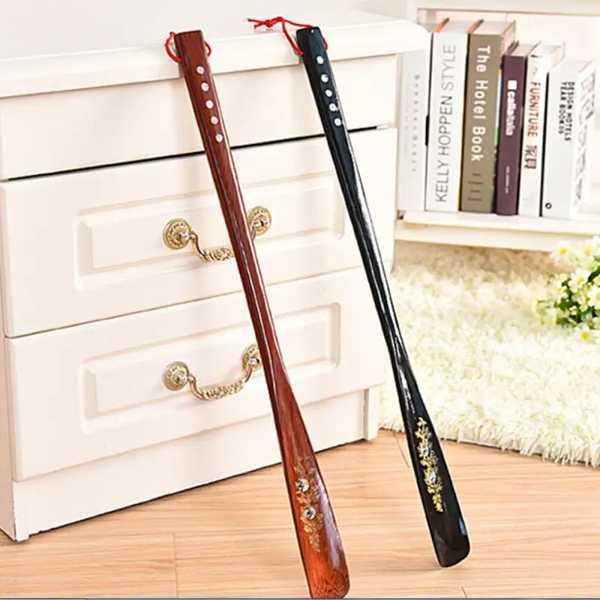 特徴:条件: 100% のブランド新色: 黒材料: 木材サイズ (Aprrox): 21.5 インチ (55 センチメートル)カラー:をカラーはランダムですパッケージ内容:1 個木製靴ホーン     '