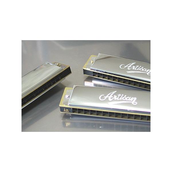 トレモロハーモニカで　きれいなビブラート演奏が楽しめます。24穴　2段Ｃ，Ａ，Ａｍ　3本セットです。。 教本は　入門用から名曲まで　いろいろな曲が　幅広く掲載されています。土日祝日はお休みをいただいております。