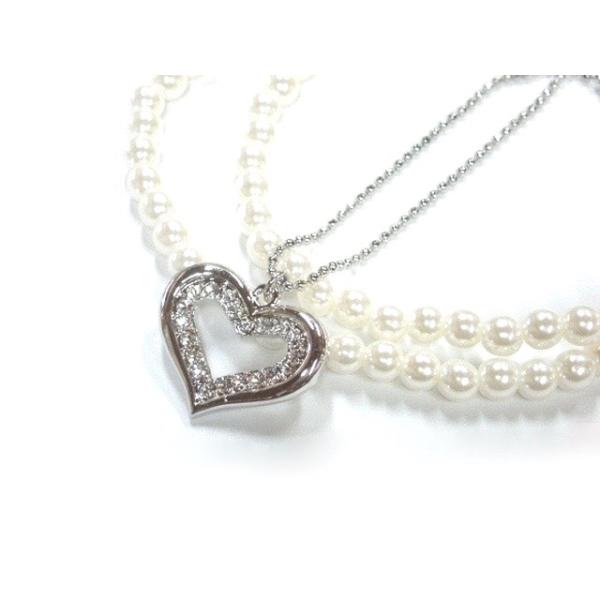 【商品説明】ストーンがビッシリの、オープンハートが下がったチェーンとパールのダブルネックレスです！普段使いはもちろん、デートやパーティーに♪彼女へのプレゼントにも喜ばれるアクセサリーです。                          ...