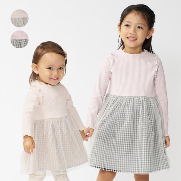 衿ぐりのメロウフリルがアクセントの長袖ワンピース。優しいWガーゼのギンガムチェック柄生地にチュールを重ねたスカートのデザインがポイント！身頃は縦縞模様の凹凸感があり、伸縮性、ストレッチ性があって伸びの良いテレコ素材。秋のお出かけにオススメな...