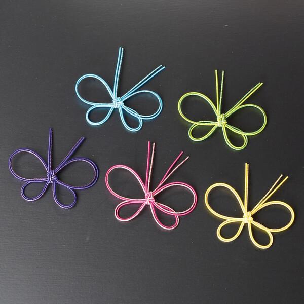 【発売日：2025年08月28日】水引蝶結び 各色混合 50ヶ入 演出小物 イベント パーティーグッズ 日本製ラメ入りでおもてなしを華やかに。可愛らしい、ちょうちょ水引飾りです。業務用の商品ですが、パーティー小物としてやご家庭用のキッチン小...