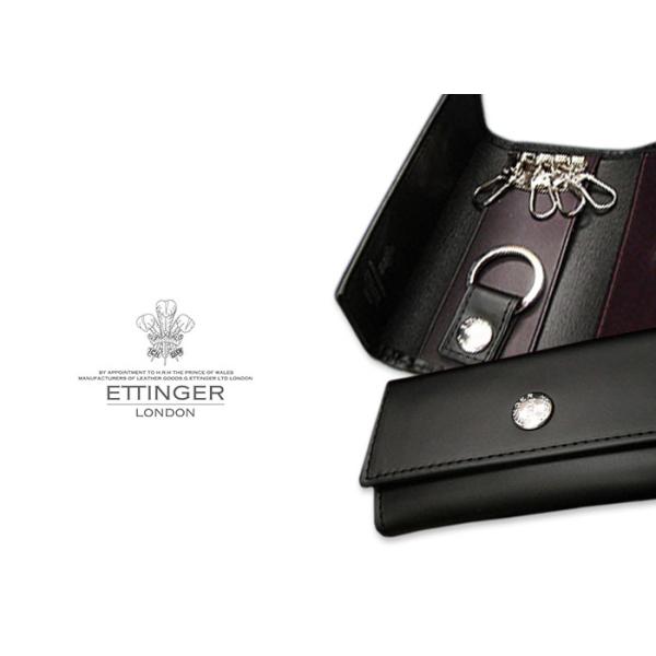 カラー：表側 ： 表側 ： ブラック　/　内側 ： ビオラ ( 濃い赤ワイン )素　材：表側 ： 表側 ： ブライドルレザー ( 牛革 )　/　内側 ： シャドーハイド ( 成牛革 )サイズ：縦約5.4cm × 横約10.6cm × 厚み約...