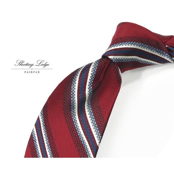 色　柄 ：ワインのサテン調織り地にネイビー×サックスブルー×オフホワイトのストライプ柄、裏地に濃紺ドット柄ジャカード織り生地を使用素　材 ：SILK 100%大剣幅 ：約8.0cm全　長 ：約145cm　※生地の伸縮による誤差が多少ございま...