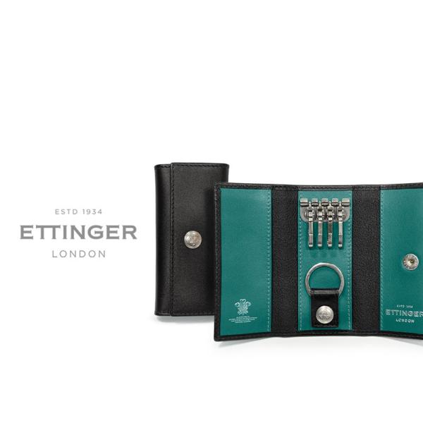 カラー：表側 ： ブラック内側 ： ターコイズ　/　パープル　/　レッド　/　オレンジシルバーブランドロゴ素　材：表側 ： ボックスカーフ　/　内側 ： スムースカーフサイズ：縦約5.4cm × 横約10.6cm × 厚み約2.0cm仕　様...