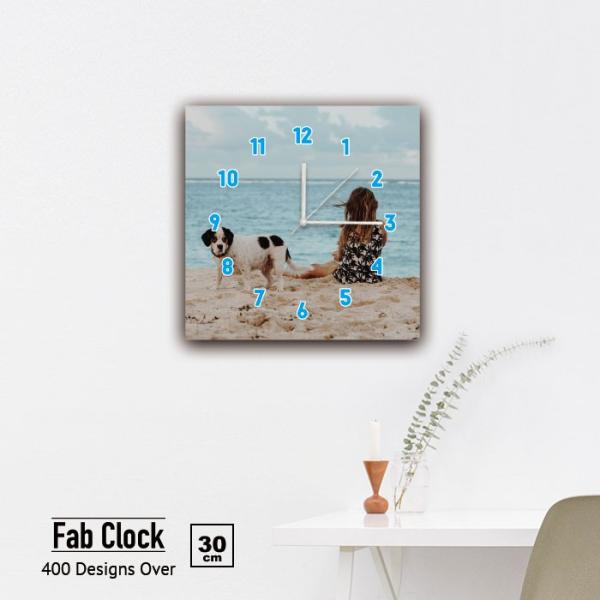 ※必ずご確認下さい。【商品種類】時計型ファブリックパネル【商品サイズ】30cm × 30cm【付属品】・簡易説明書/パネル用金具プレート2枚（ネジ付き）4本/吊り糸【商品説明】木枠にデザインを印刷した生地を貼り付けた自社オリジナルの時計型フ...