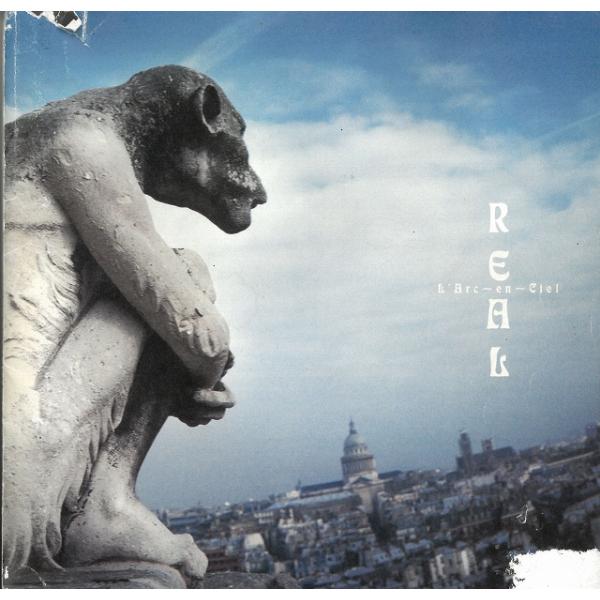 タイトル：　REALアーティスト：　L'Arc-en-Ciel※中古品ですので、歌詞カードの色褪せ・折れ・汚れなどがある場合がございます