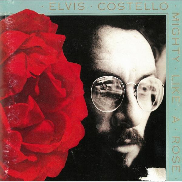 タイトル：　MIGHTY LIKE A ROSEアーティスト：　ELVIS COSTELLO　エルヴィス・コステロ※中古品ですので、歌詞カードの色褪せ・折れ・汚れなどがある場合がございます