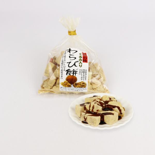商品名：くるみ入りわらび餅〇名称：焼菓子〇原材料名：砂糖（国内製造）、餅粉、水飴、くるみ、きな粉（大豆）、黒糖、澱粉、れんこん澱粉、本わらび粉／トレハロース、乳化剤、増粘多糖類、カラメル色素（一部に小麦・大豆・乳成分・くるみを含む）〇内容量...