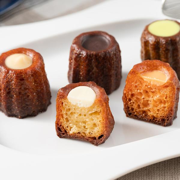 ドミニクドゥーセの店 プチカヌレギフト DM-PC3表面はカリッと中はもっちりとした伝統的な食感で人気のカヌレをプチサイズで5種類セットにしました。 かわいい見た目で食べやすいサイズながら本格的な味わいをお楽しみいただけます。 ■商品詳細：...