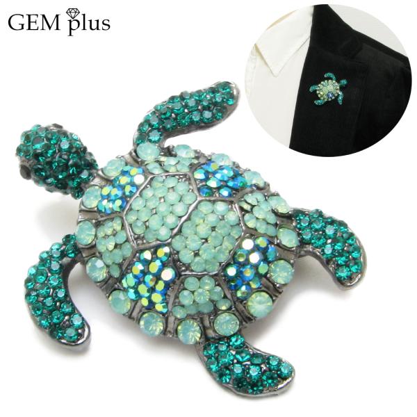 鮮やかなグリーンが美しいかわいいカメのブローチカメは長寿や長生きの象徴としても人気のモチーフです大きめサイズの立体的なフォルムにたっぷりのラインストーンを飾りましたスーツやジャケットの襟もとにはもちろん！ワンピースやバック、帽子などお好きな...