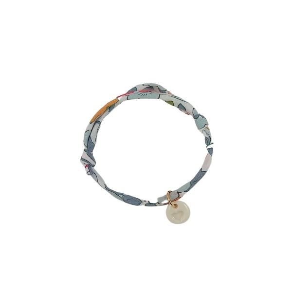 ObiObi Paris   Bracelet Porcelaine Coeur リバティ Betsy　/ベッツィー ＆ 磁器リバティの生地に磁器製のハートの刻印入りチャームがアクセント。コードはスライド式、調節可能で全ての手首のサイズに対...